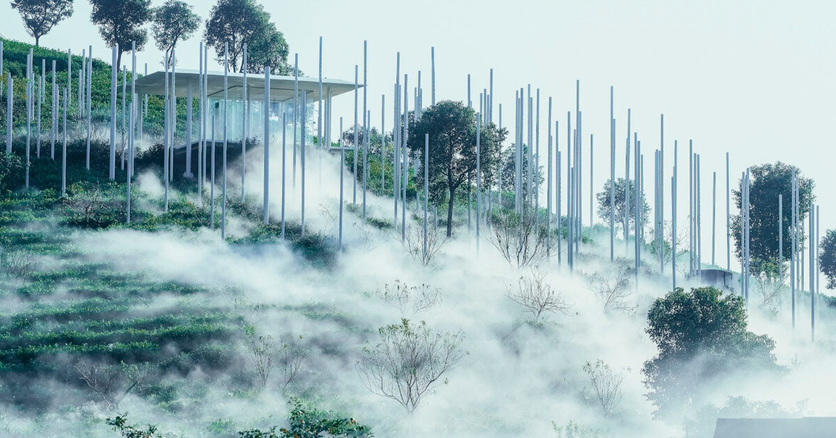 cloud tea room emerges from chinese hillside along with white steel poles