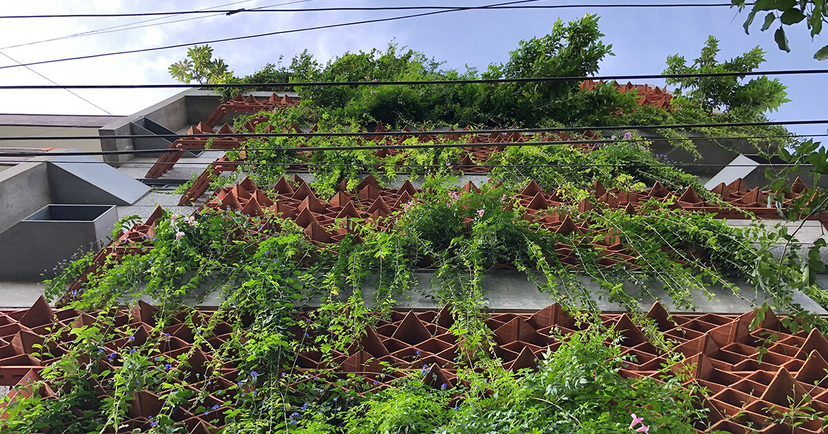 terracotta tile screens clothe residential facade in india with a green ...