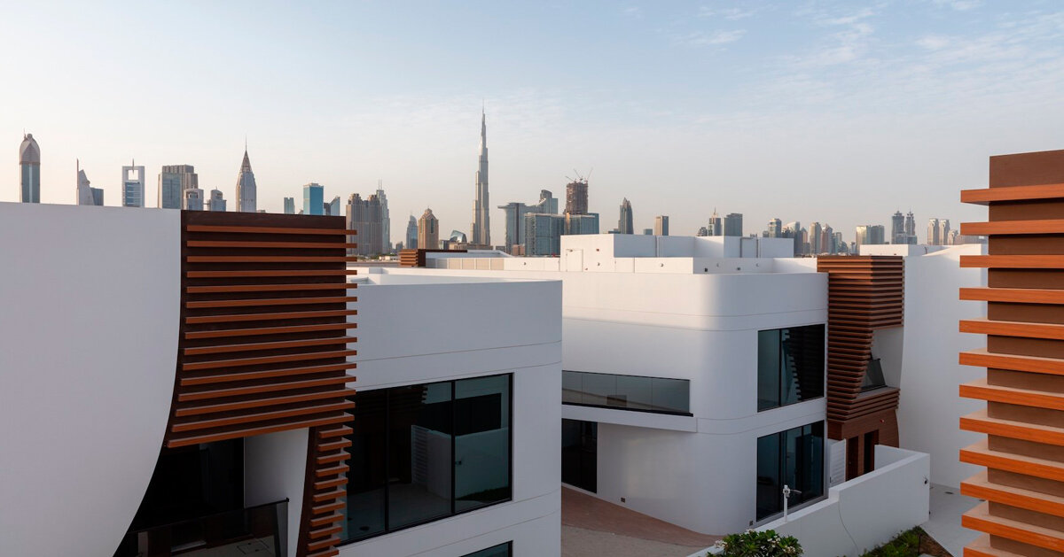 twenty-eight curved townhouses compose the fold residential complex in dubai