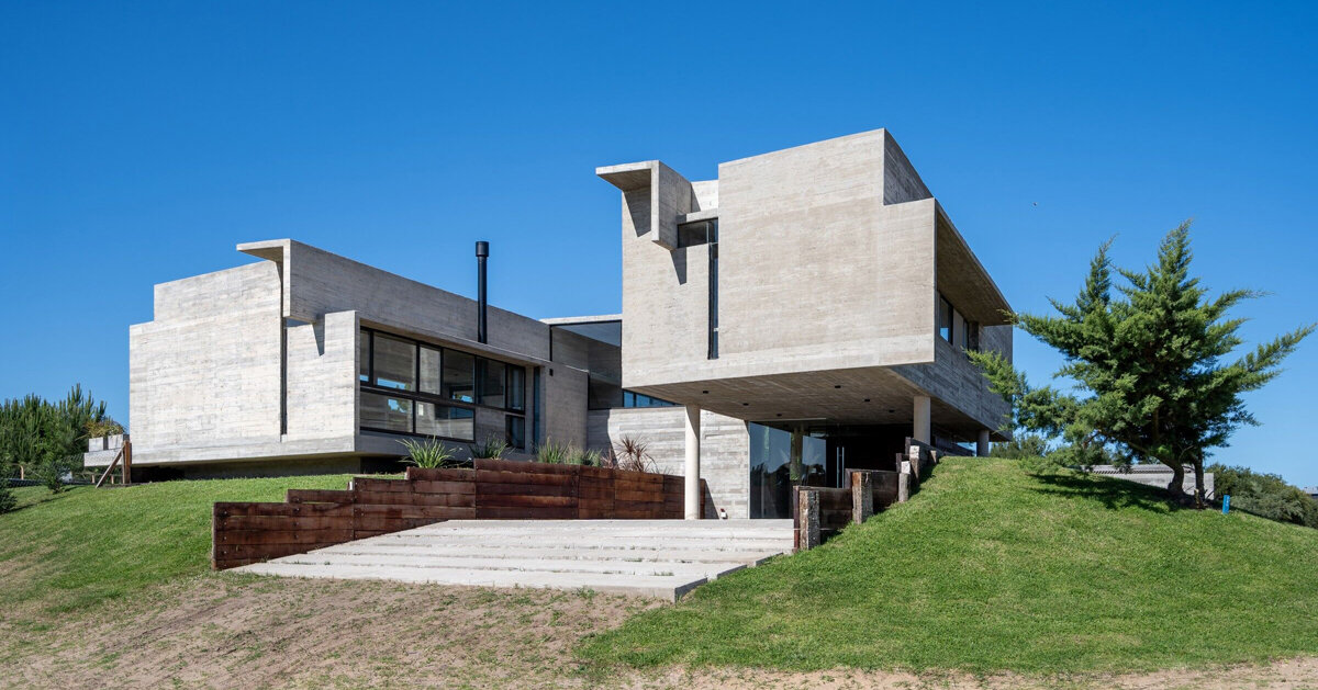 two elevated concrete prisms shape residence in buenos aires