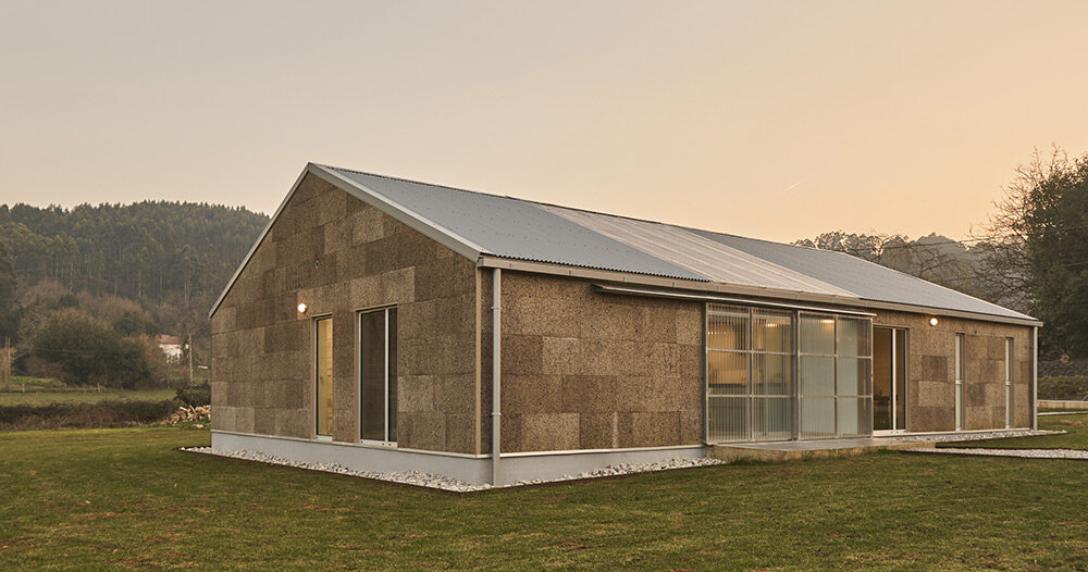 a cork and wood house is built by gurea arquitectura cooperativa