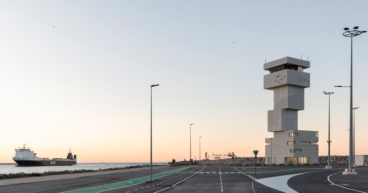 stacked white concrete boxes compose towering harbor master's office in ...