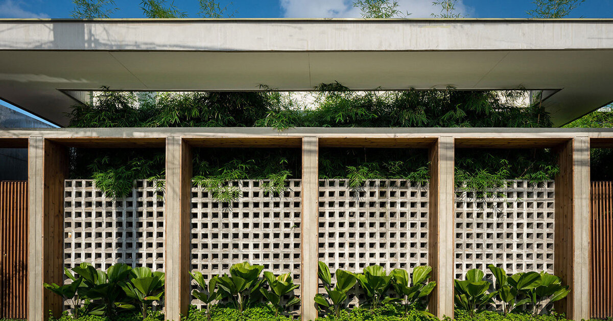 residence's concrete block screen welcomes sunlight in manila