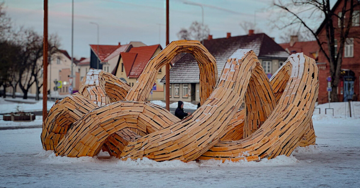 wooden shingles compose uv lab's undulating installation in estonia