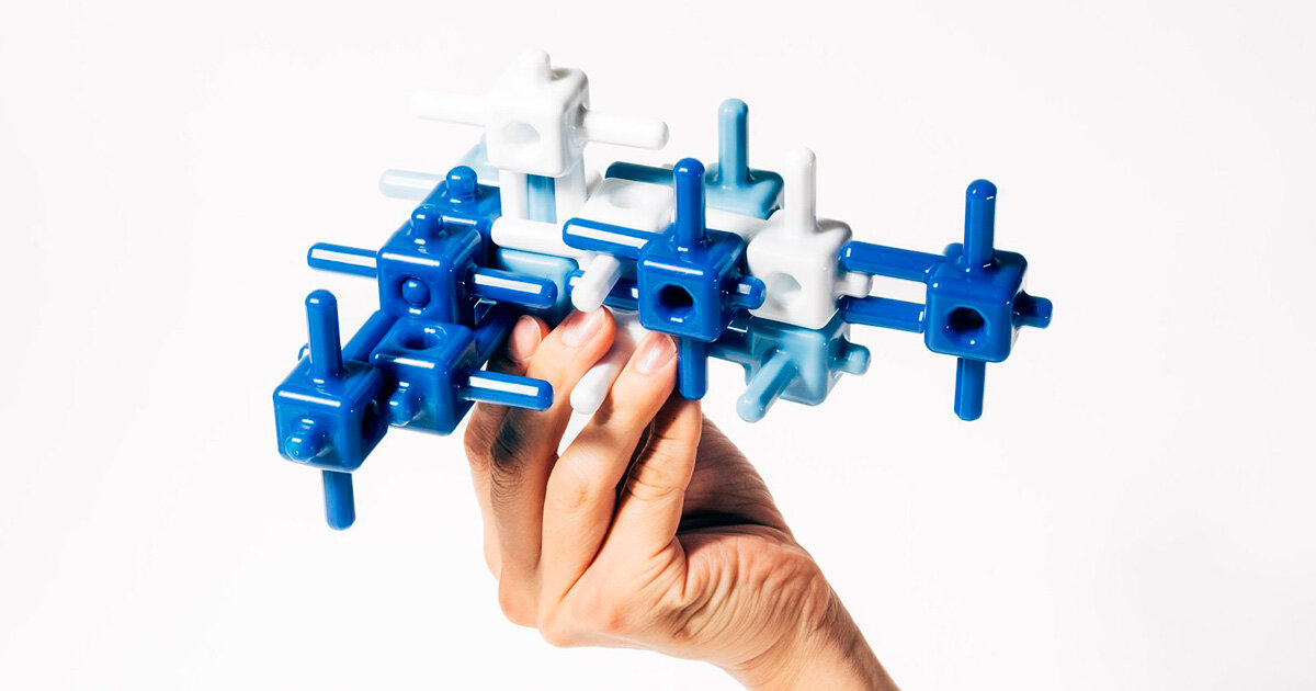 modular human-shaped blocks interjoin to create countless building ...