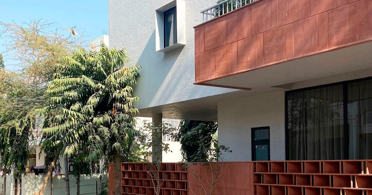 red sandstone jali lattice encloses jaipur house's facade by nuar studios