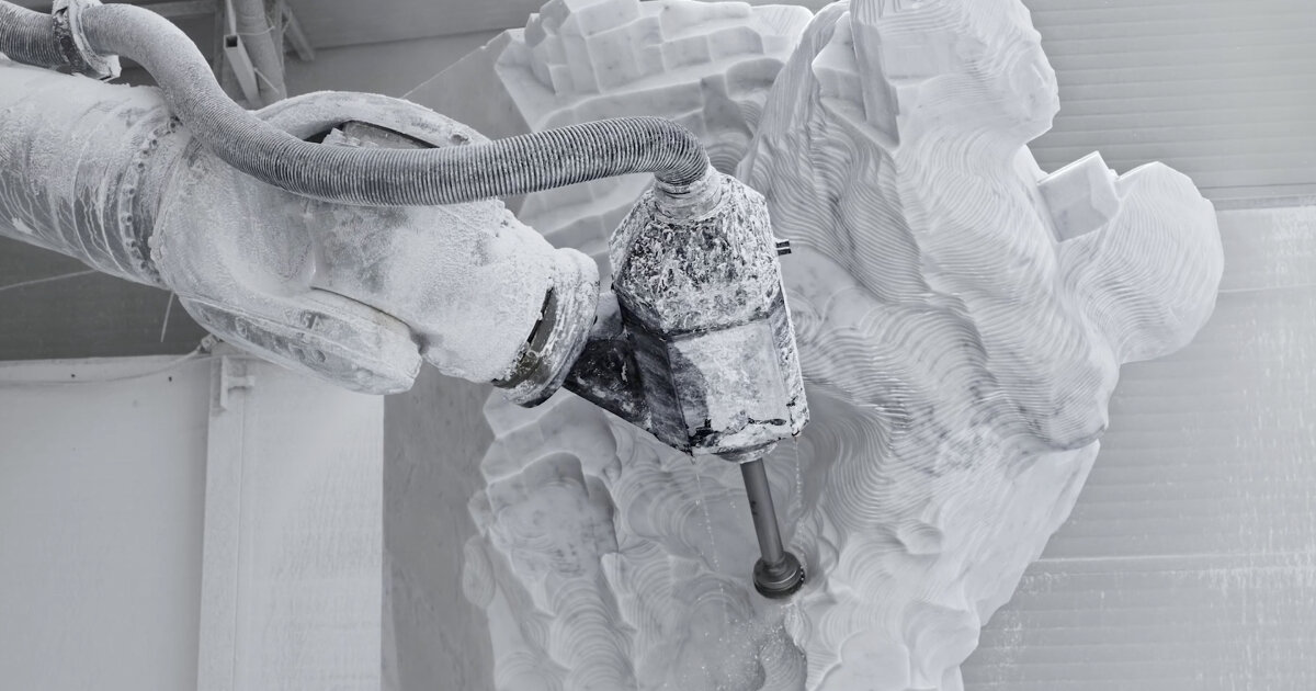 robot arm and its unfinished marble sculpture play the lead in quayola ...