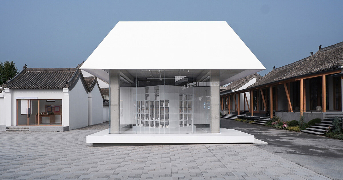 translucent pitched roof tops glass-clad store by designRESERVE in ...