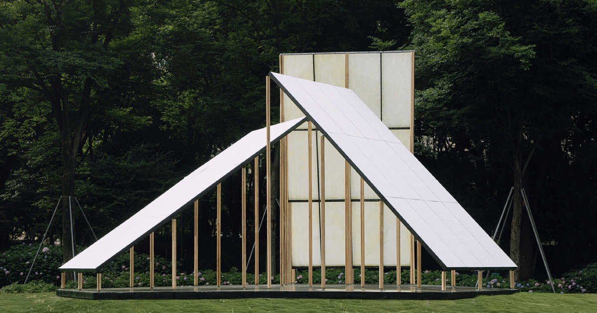 translucent panels of galaxy arch's installation cast warm glow across ...