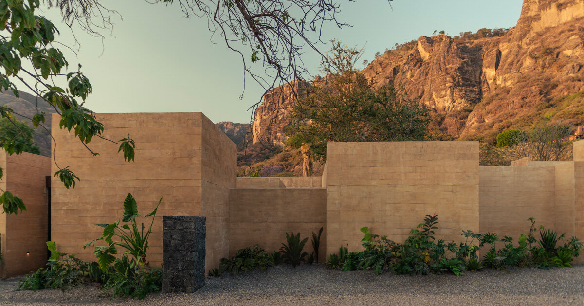 RA! sculpts monolithic house emerging from rocky cliffs in mexico