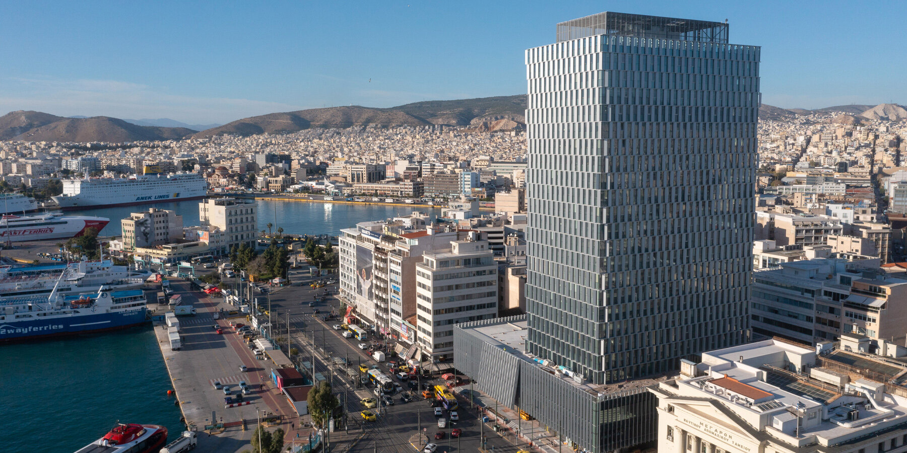 piraeus tower reopens in athens with spring pattern facade by PILA