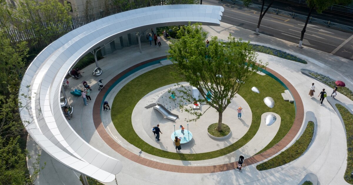 concentric pathways and gardens encircle HID's connective urban node in ...