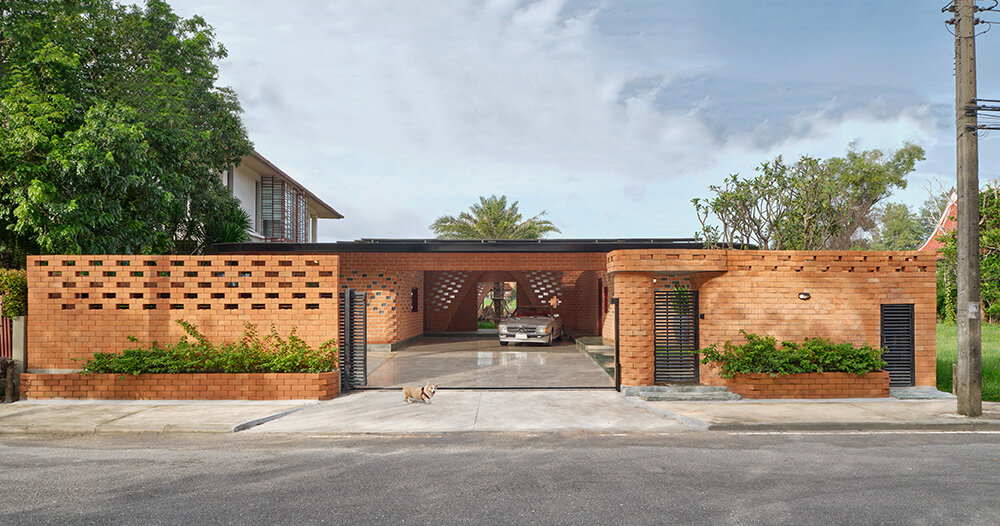 enter projects asia creates biophilic 'brickhouse' for tropical thailand