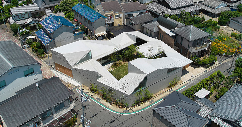 faceted rooftop encloses tomohiro hata's house in muko, kyoto