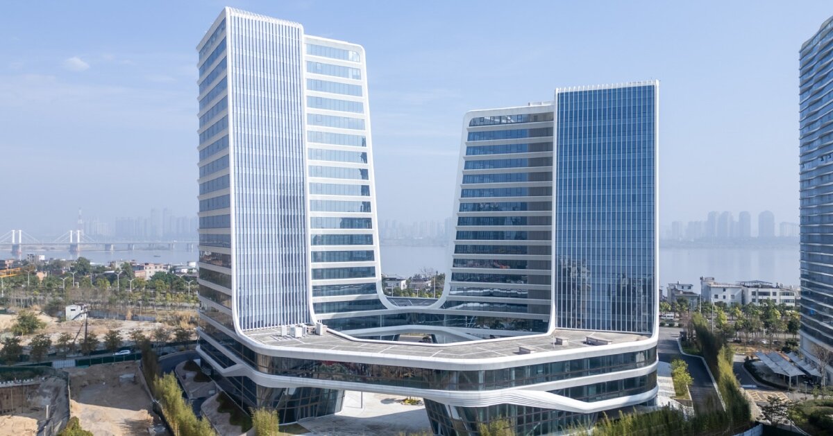 curving towers of LYCS architecture's mixed-use complex echo ripples of ...