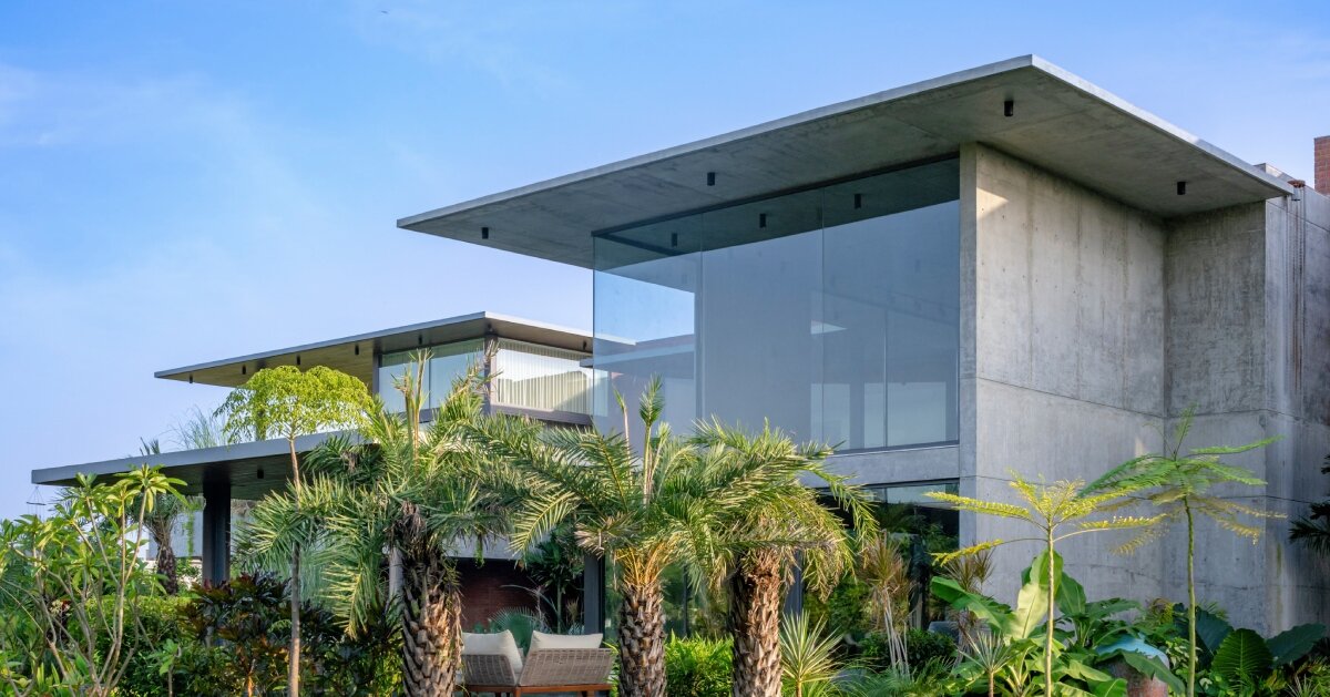 water features and greenery wrap hiren patel architects' house in india ...