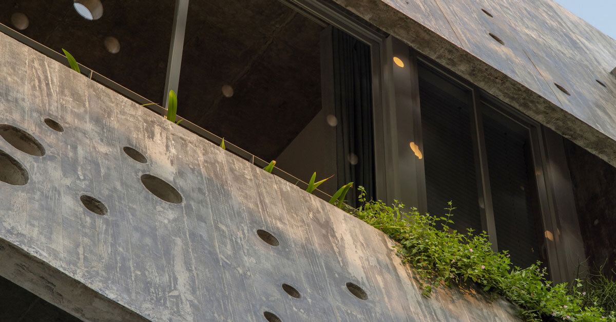 irregular dual-layer concrete facade enfolds M+TRO.studio's kho ren house