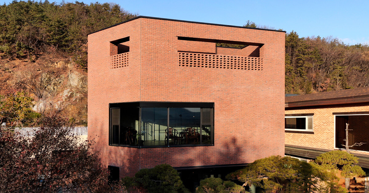 monolithic brick-clad annex by LKSA expands existing residence in ...