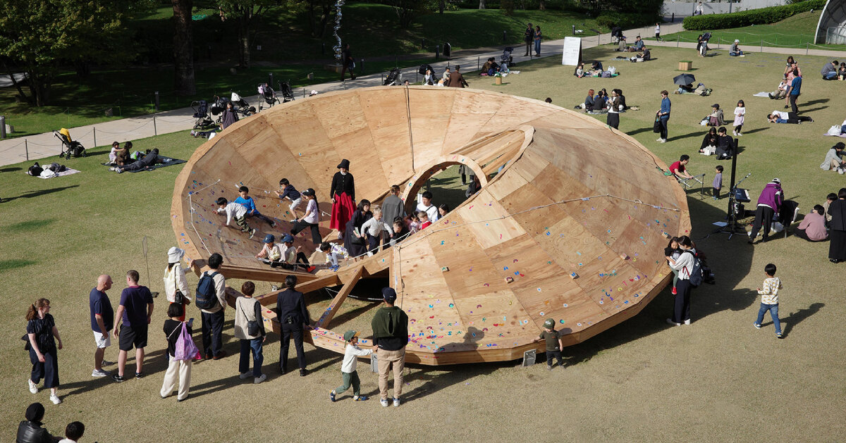 three interlocking timber rings shape TAILAND's pavilion in tokyo