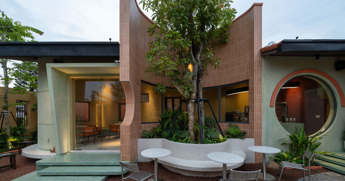 red brick wall encircles minji cake bakery's garden in vietnam