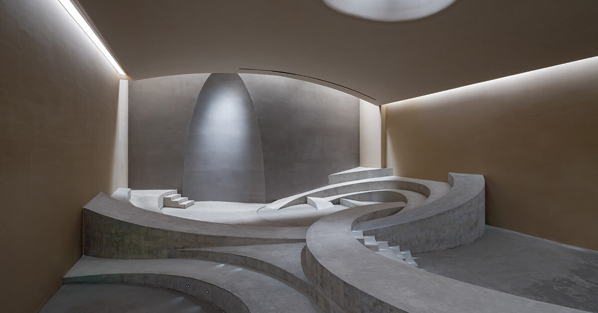 spActrum sculpts multi-centered concrete interior as continuous ...