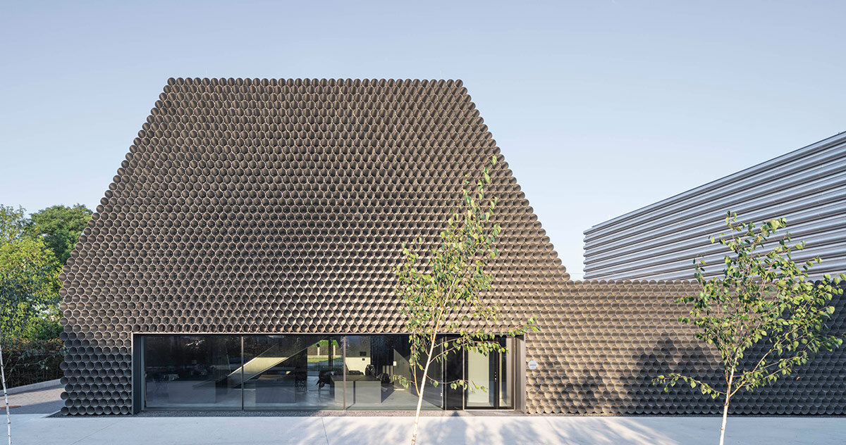 KWK promes' gambit office mimics a stack of industrial pipes