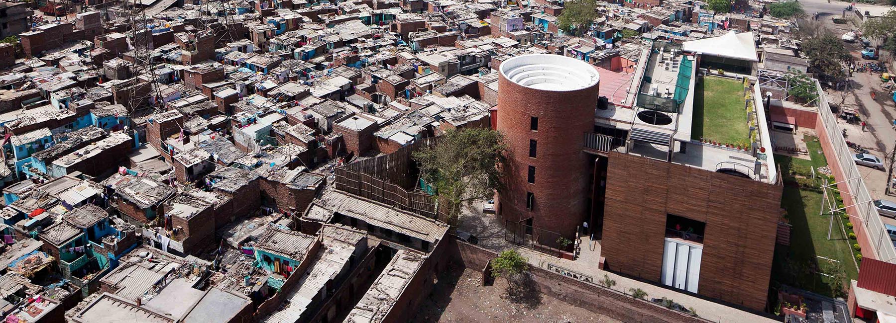 archohm's head office in india echoes a visual collage of materials and ...