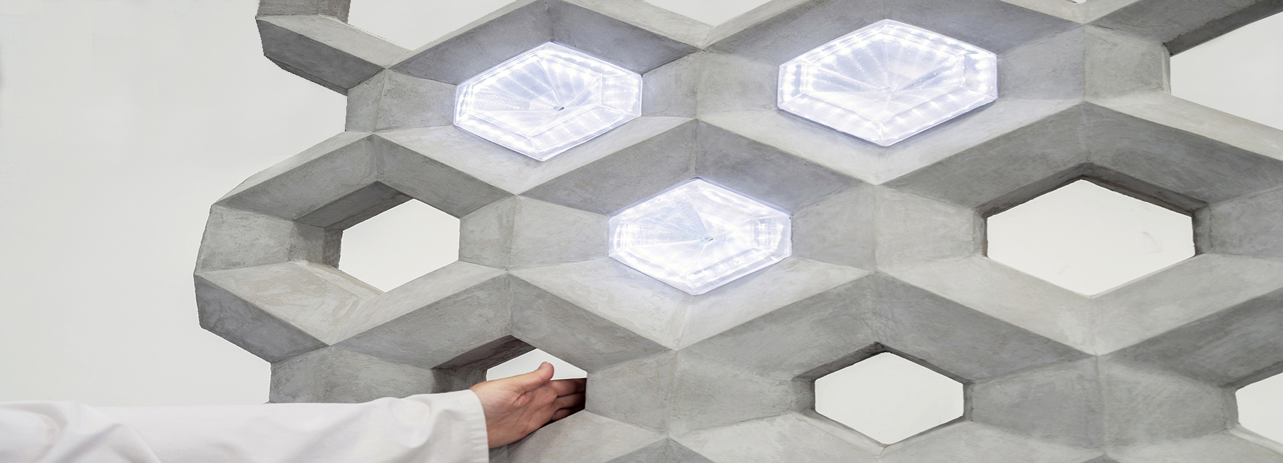 the world's first 'smart concrete wall' is activated by the touch of a hand