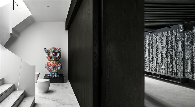 wei yi design creates a family home of monochrome + marble