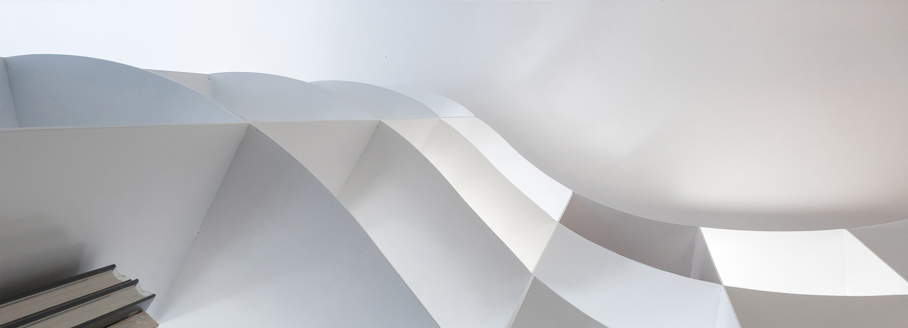 aether architects' concave and convex book pavilion in shenzhen