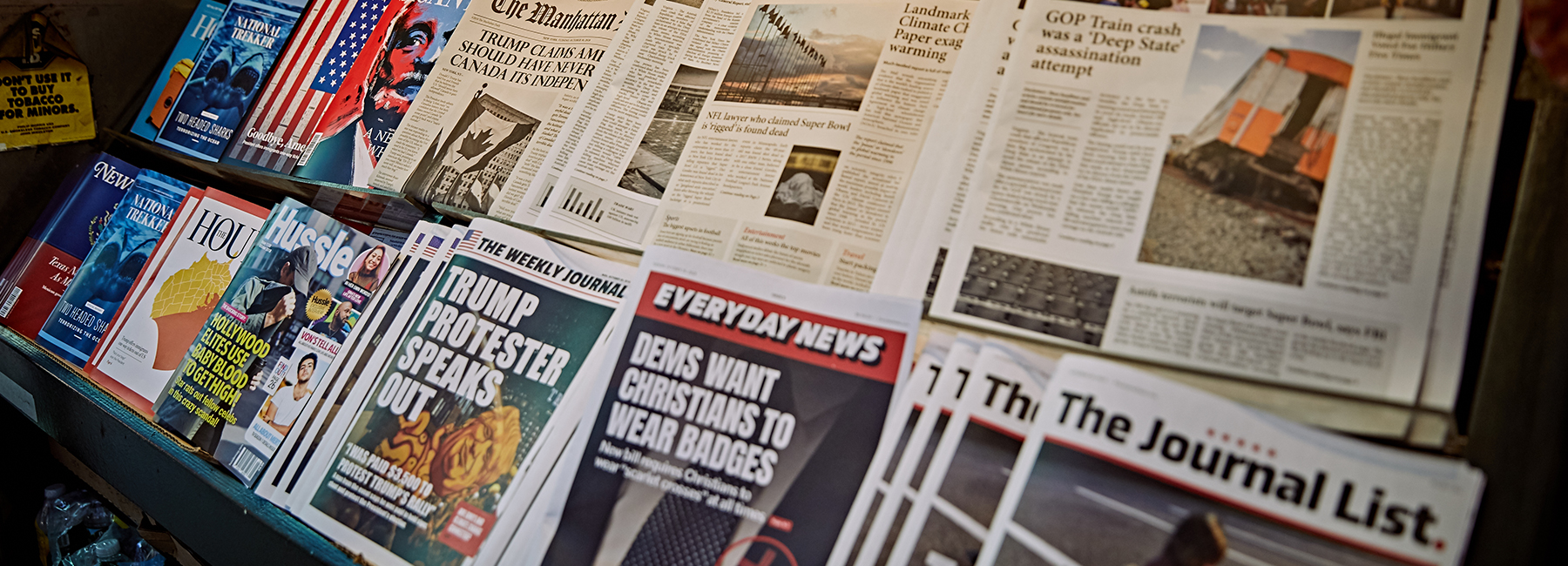 the fake newsstand prints headlines from the internet into real newspapers