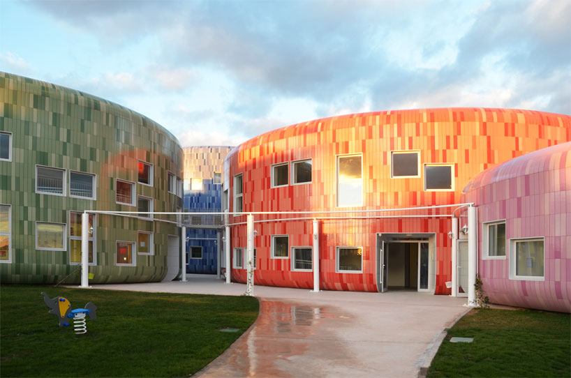 children's innovation centre in valencia clad in colorful tiles