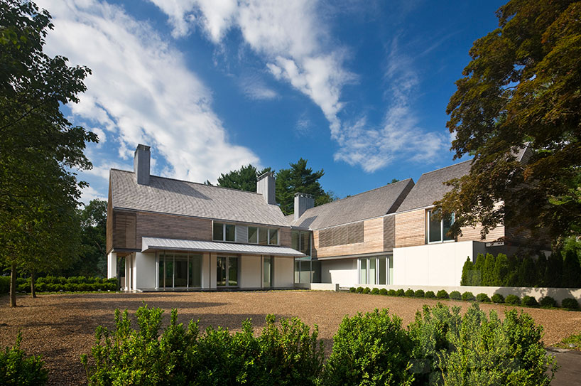 joeb moore + partners slices gable-roofed house
