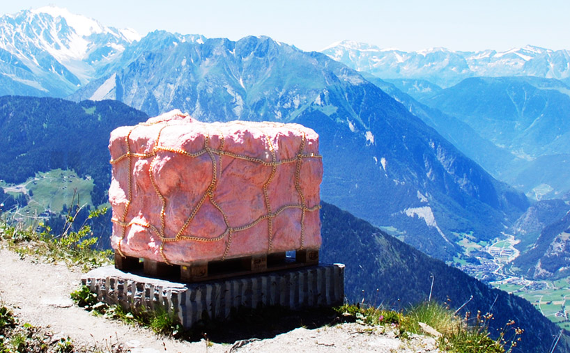 andrea hasler installs flesh sculptures on the swiss mountains