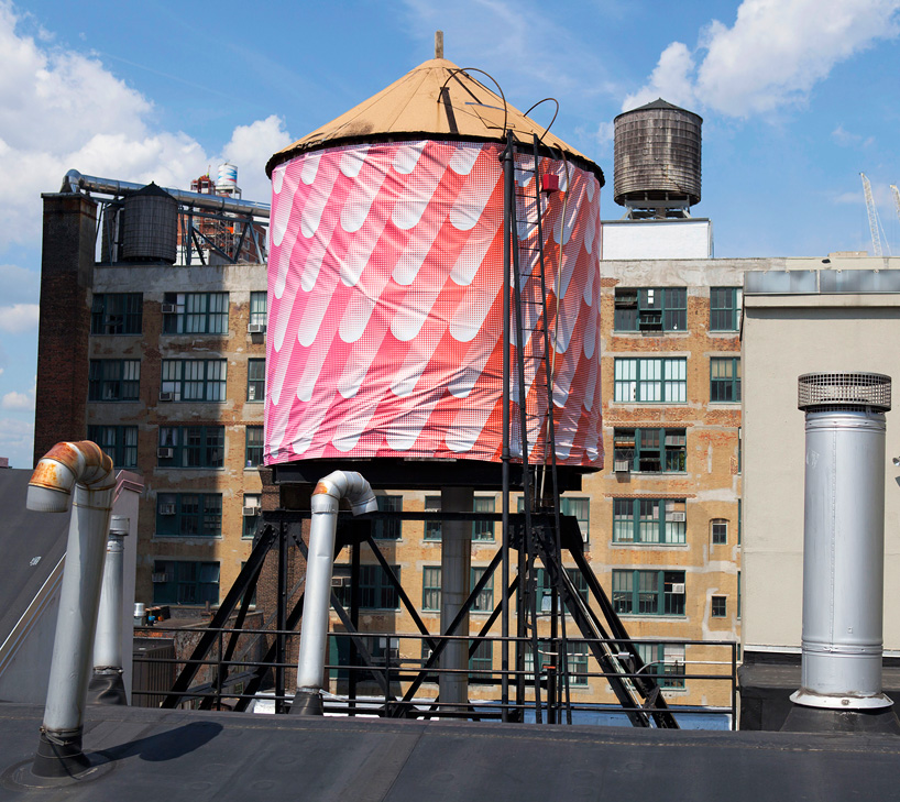 acclaimed artists redefine the skyline by wrapping NYC's water tanks