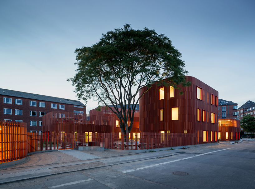 COBE unites kindergarten in copenhagen with vertical brickwork