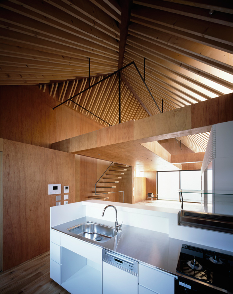 apollo architects enhances nord house's asymmetric ceiling with exposed ...