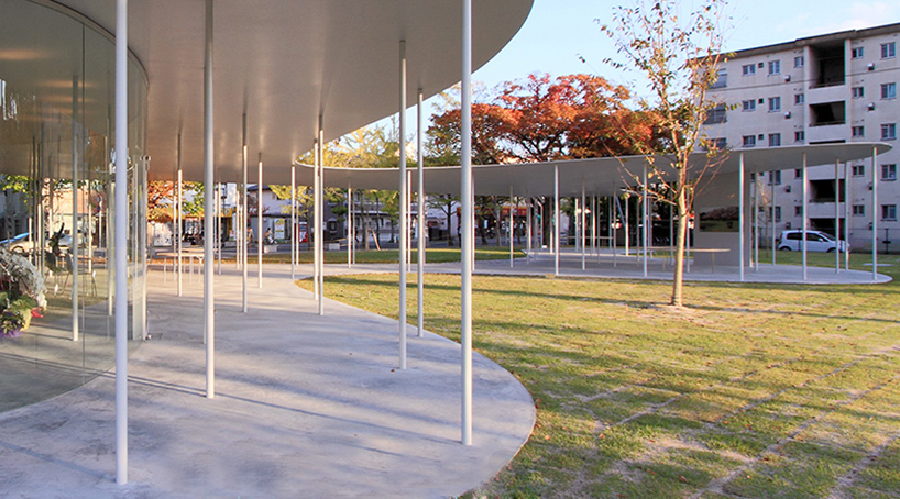 SANAA sets university café beneath sinuous steel canopy