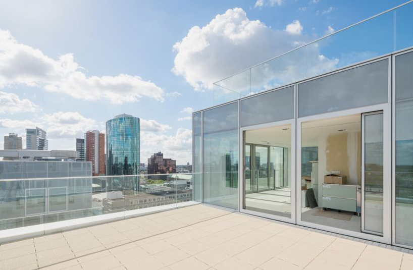 OMA’s mixed-use timmerhuis opens in rotterdam