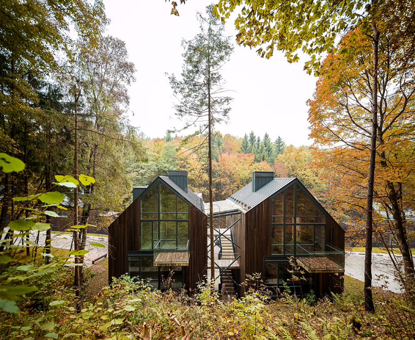 paleko + plazma nestles wooden housing development in a lithuanian ...
