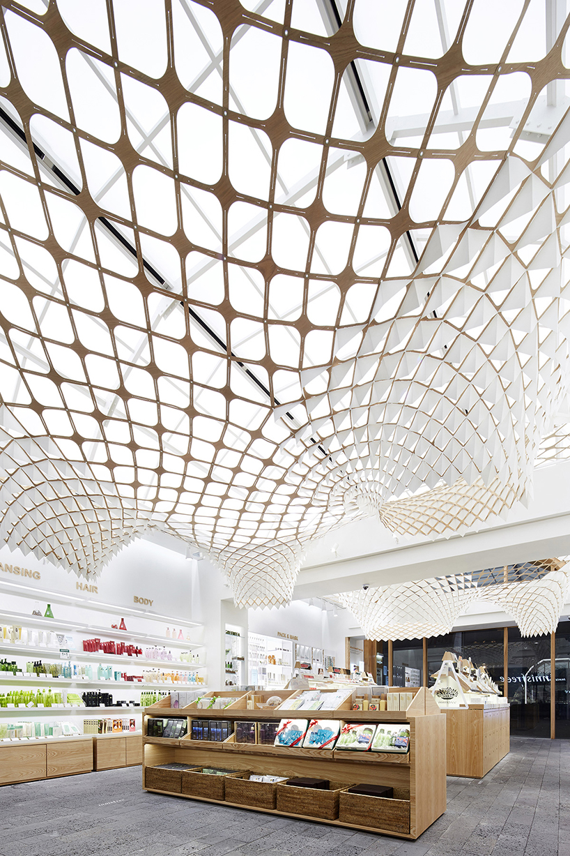 SOFTlab weaves undulating greenhouse lattice through innisfree shop in ...