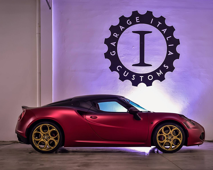 lapo elkann's garage italia customs splashes two-tone black and red ...