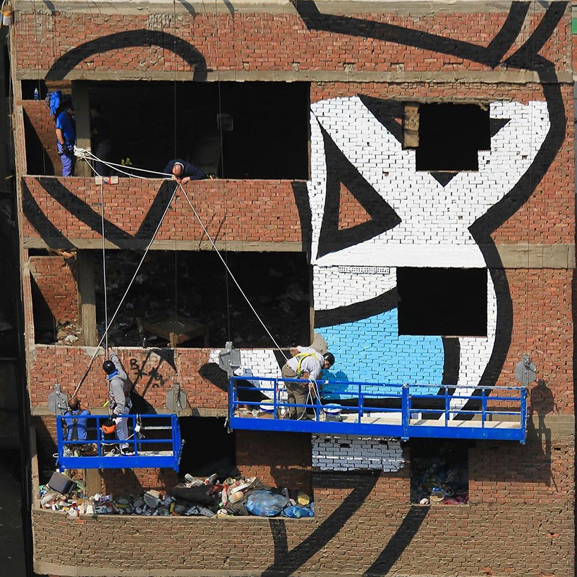 eL Seed challenges cultural perceptions with city-scale anamorphic art ...