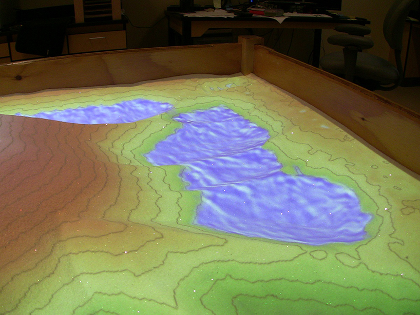 AR sandbox lets users shape lakes and create peaks through accurate ...