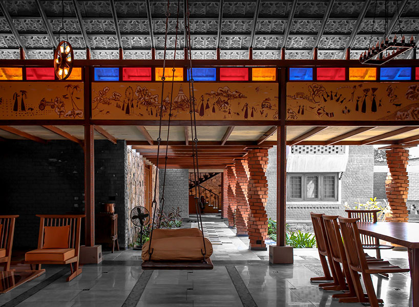 twisting pillars and traditional flourishes accent this family home ...