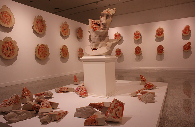 cao hui's dissected classical sculptures turn solid stone into fleshy forms