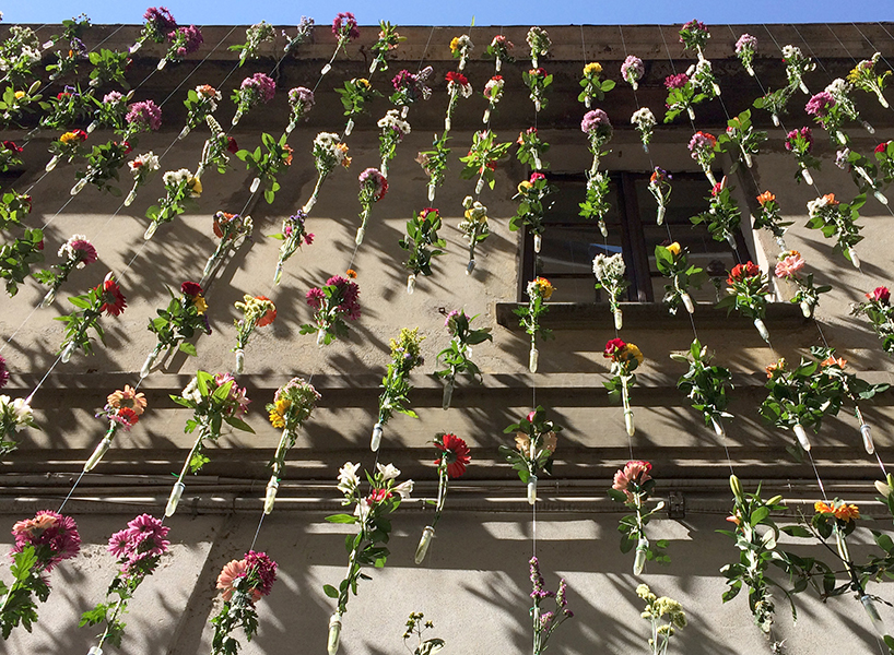 the flowers have been hung and organized using an ancient technique ...