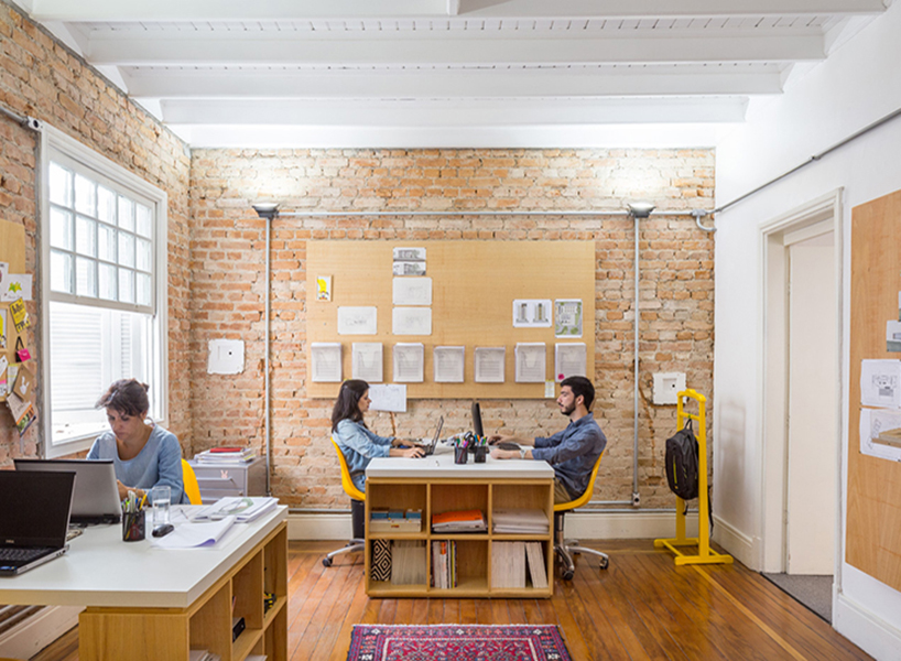 the overall design is marked by occasional bright yellow tones, taking ...