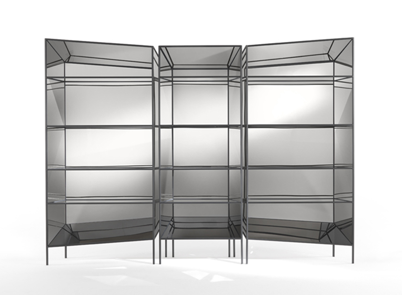 the set of bookshelves-cabinets is influenced by the middle age and ...