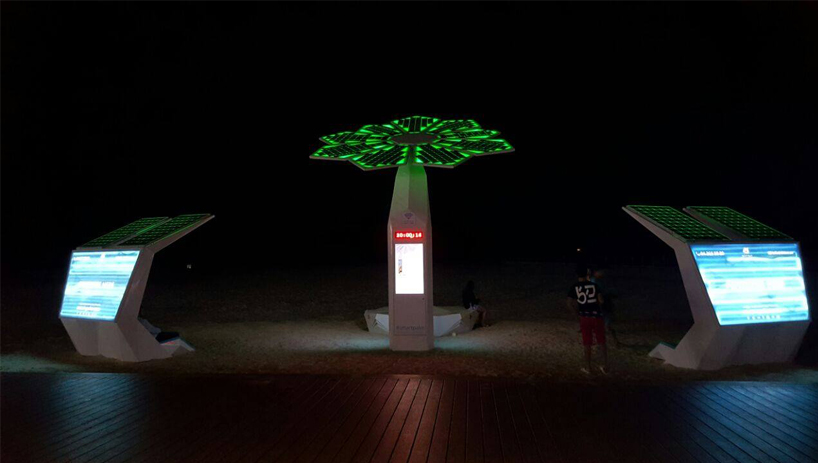 solar powered smart palm trees provide dubai with WIFI & charging points